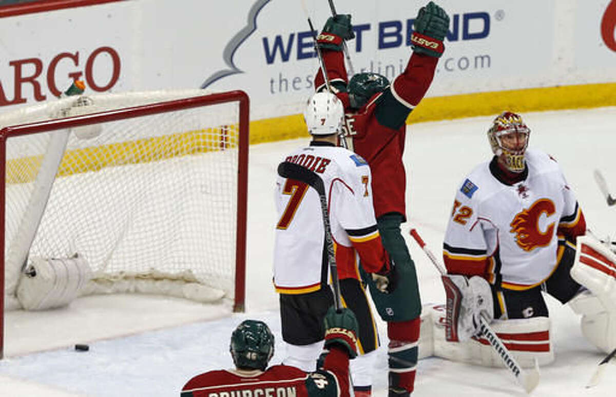 Parise scores 3 to lead Wild past Flames, 6-2