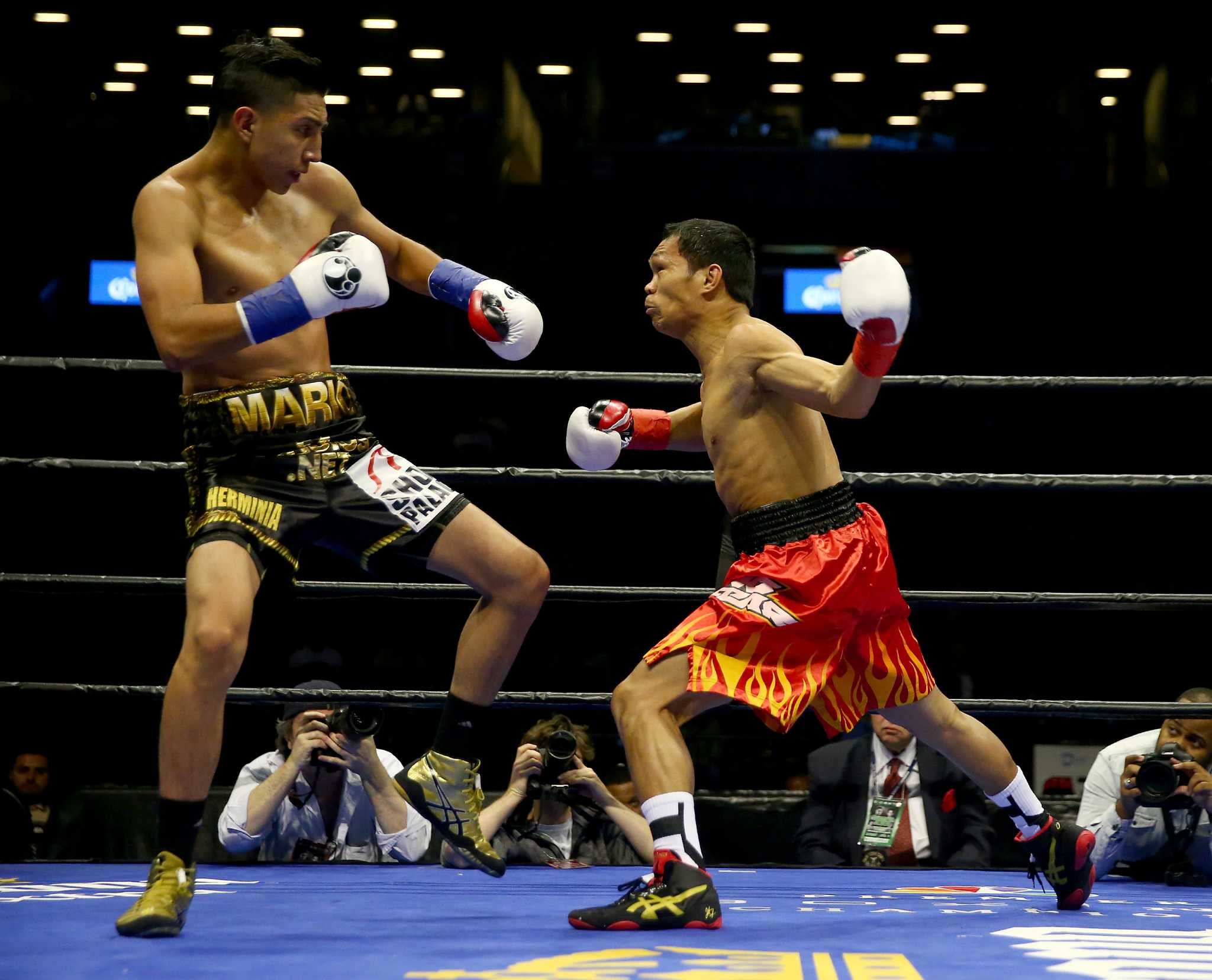 S.A. boxer Barrios shakes off lackluster performance