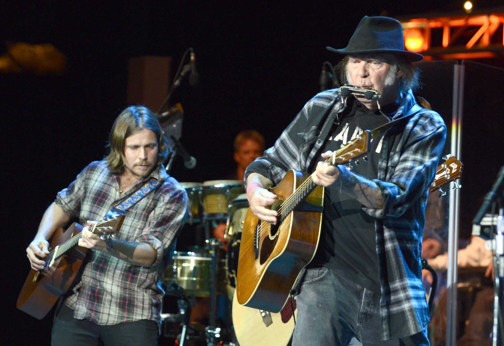 Willie Nelson’s sons ‘riding it like a big wave’ with Neil Young