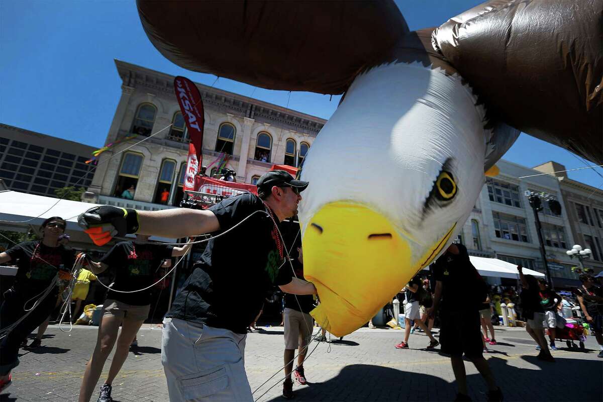 Sun shines hot on Battle of Flowers 125th anniversary