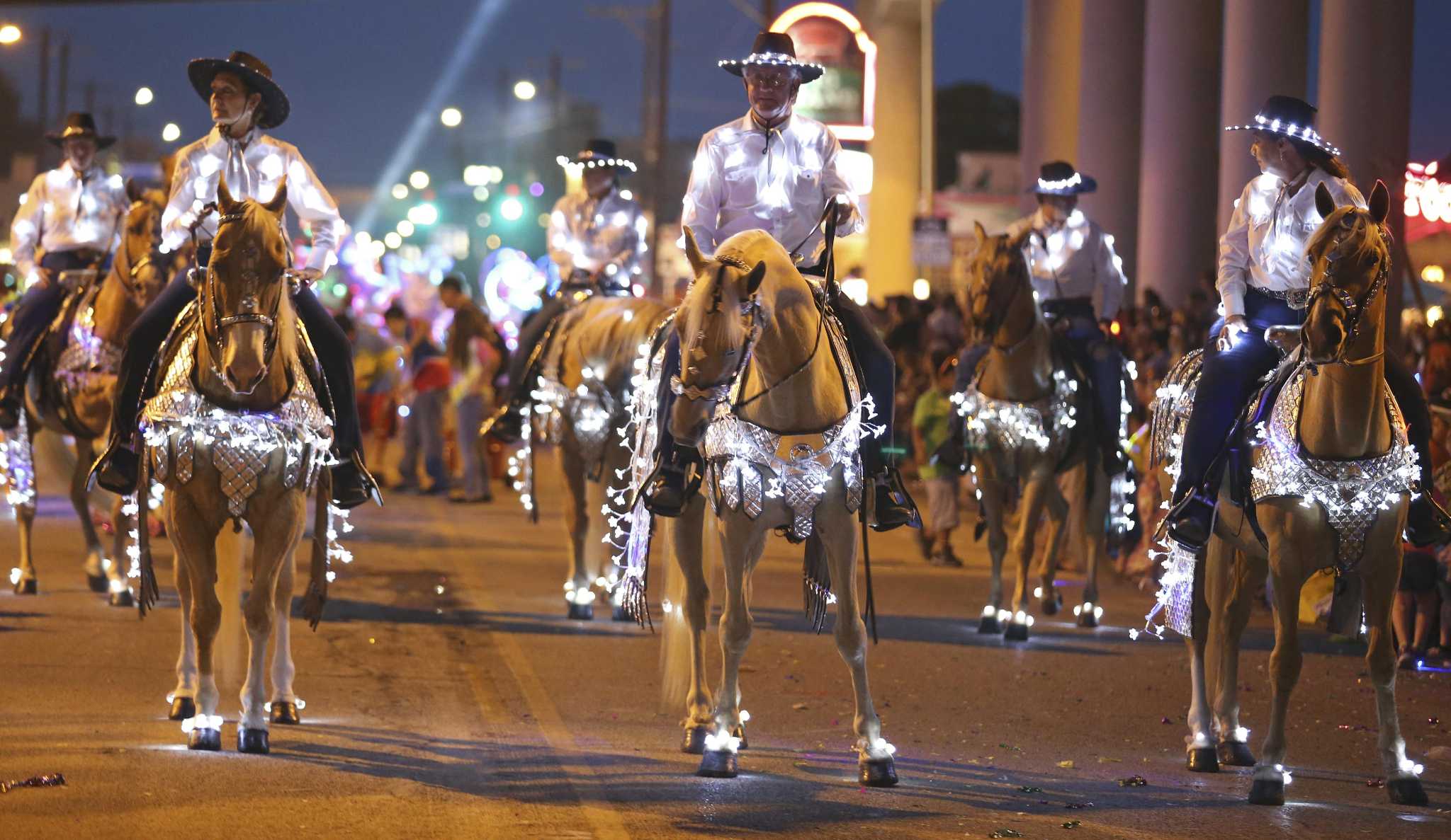 Fiesta Flambeau rolled through downtown amid laughter and light