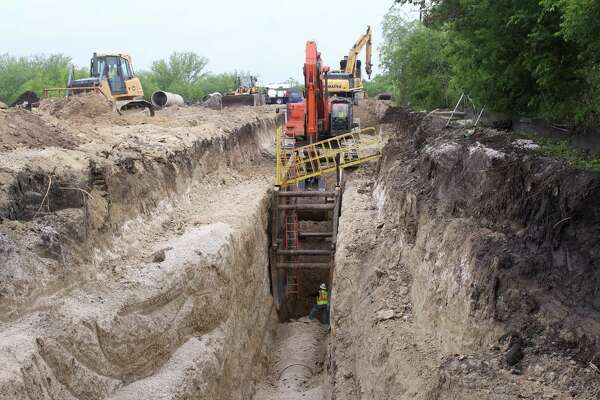 SAWS digs deep, physically and financially, to replace sewer lines ...