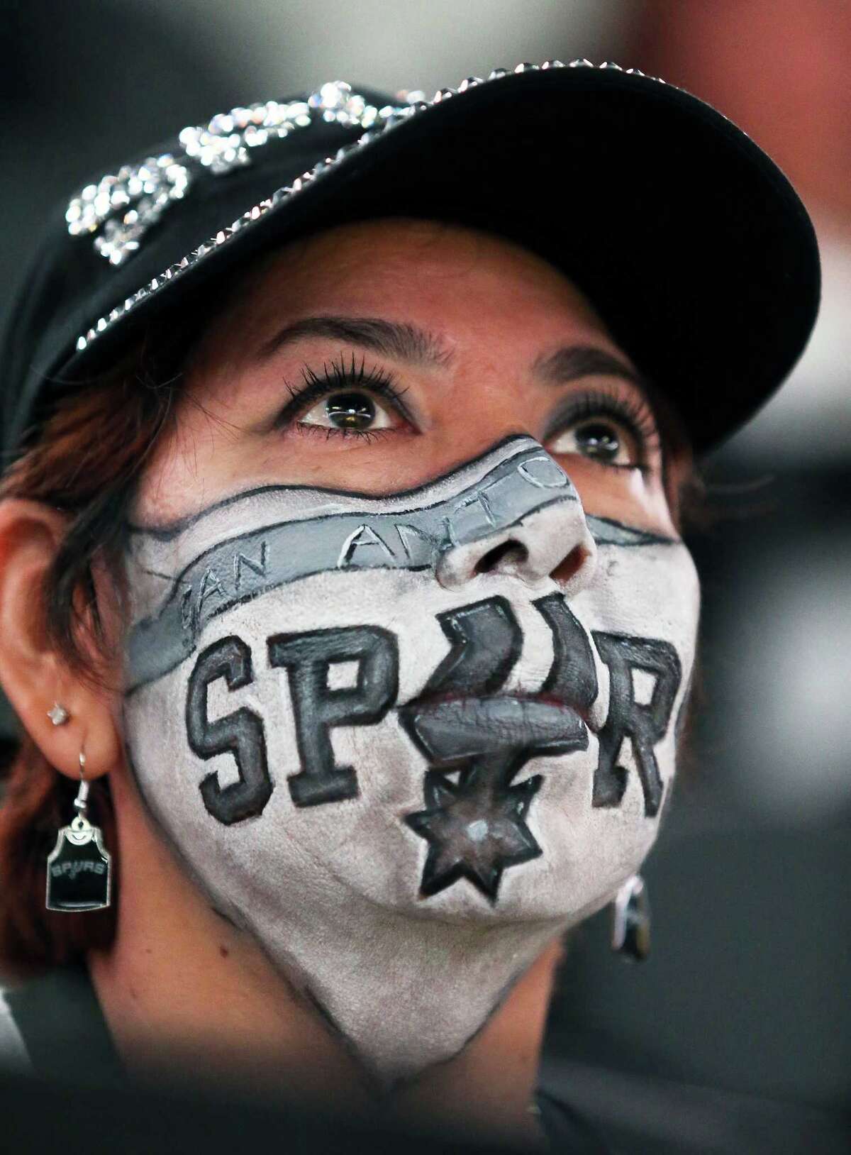 Baseline Bums leave taunting ways at Spurs games in past
