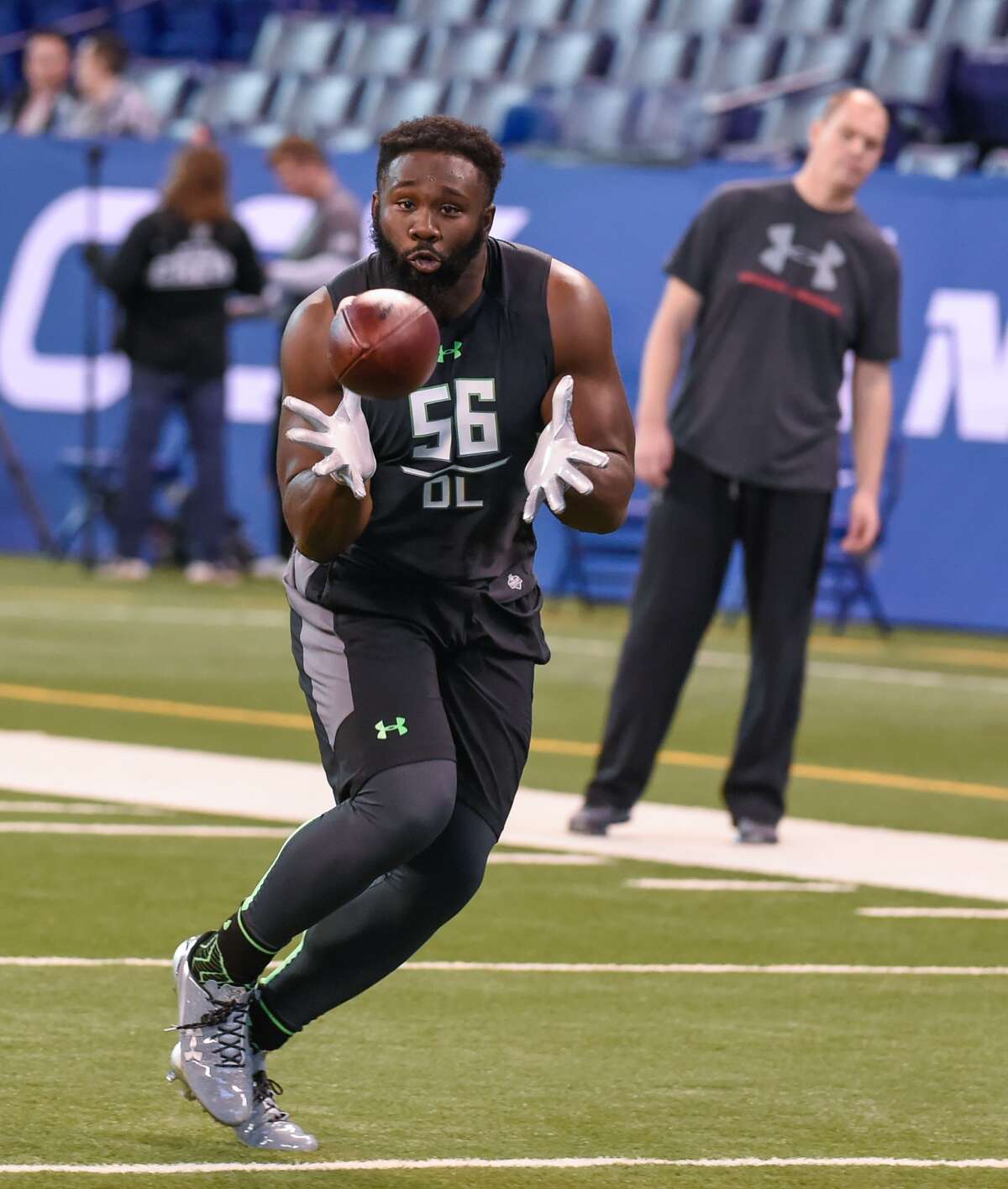 Cowboys select DE Tapper in fourth after Raiders trade up to snag QB Cook