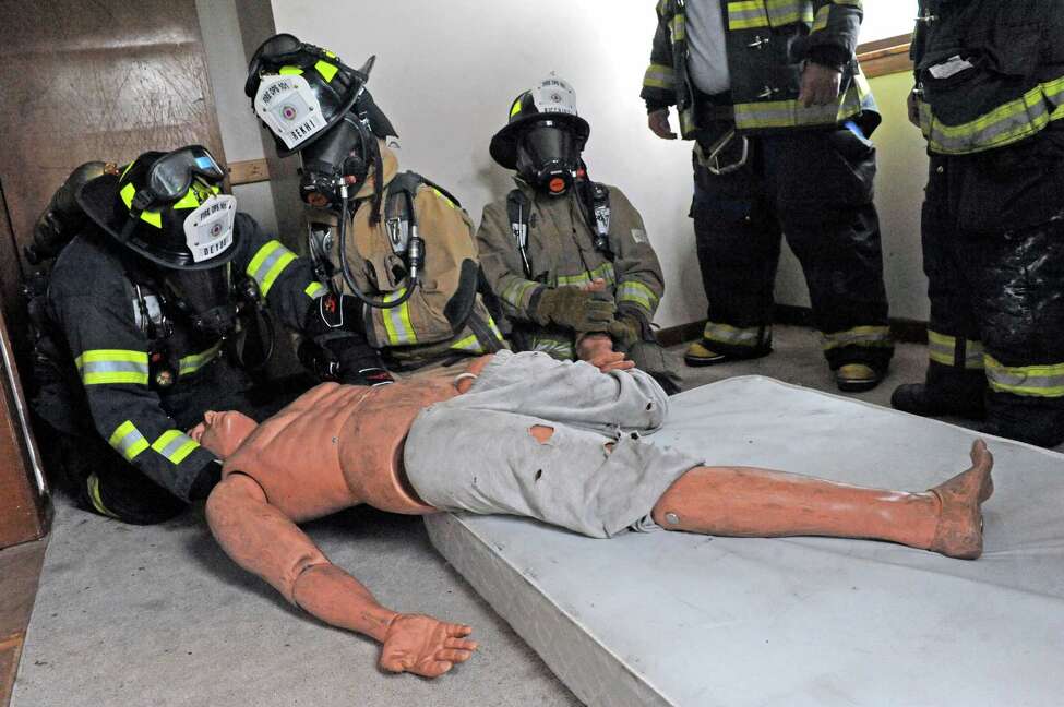 Elected officials learn firefighting techniques