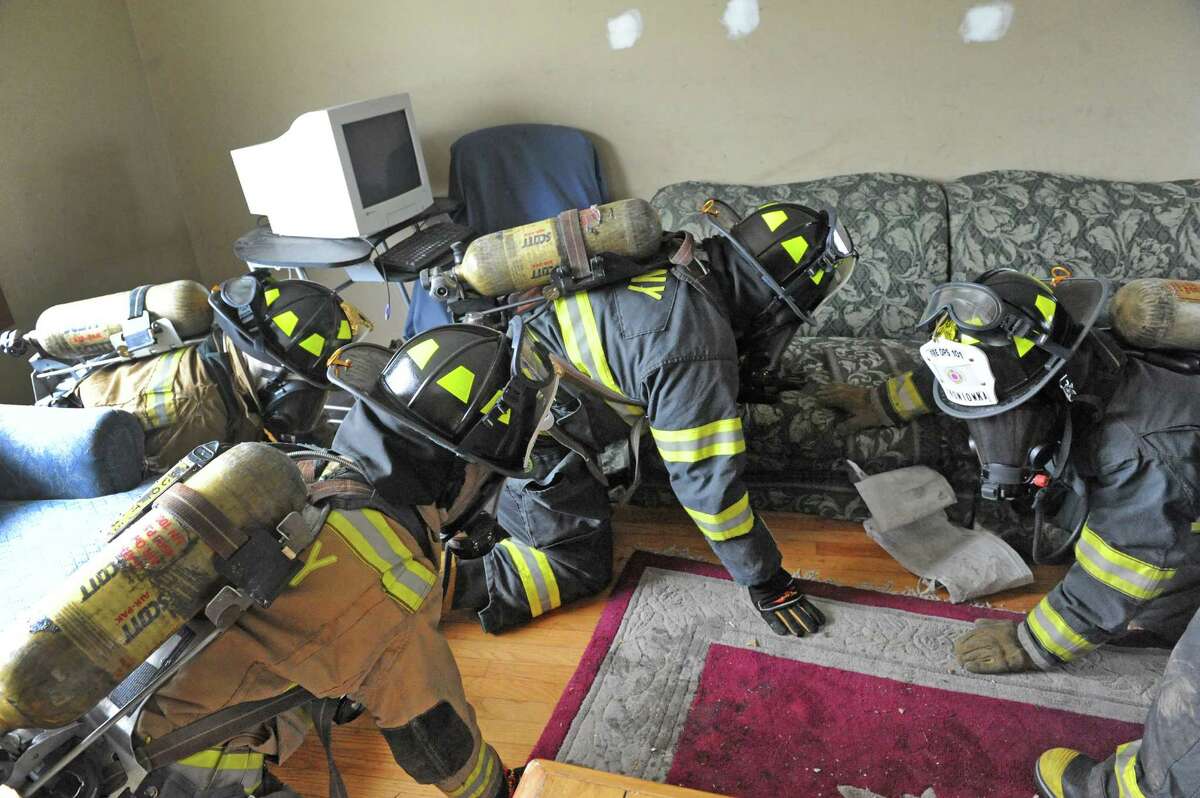 Elected officials learn firefighting techniques