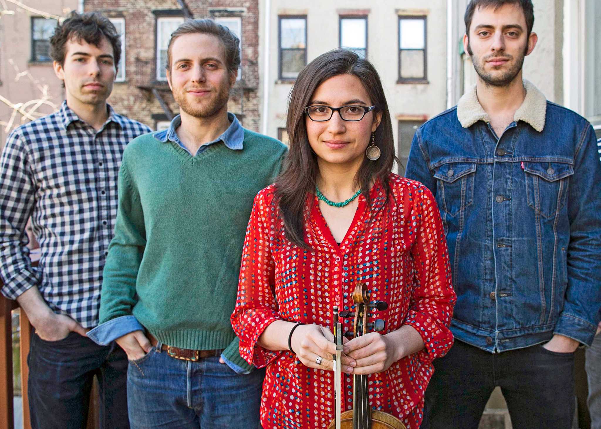 String band benefit performance at Voices Cafe