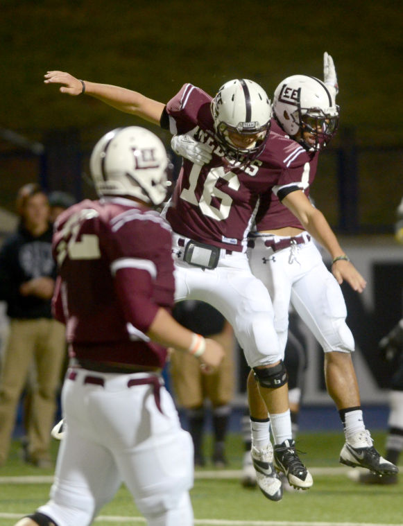 HS FOOTBALL: Rebels clinch share of 2-5A title with win over Mojo
