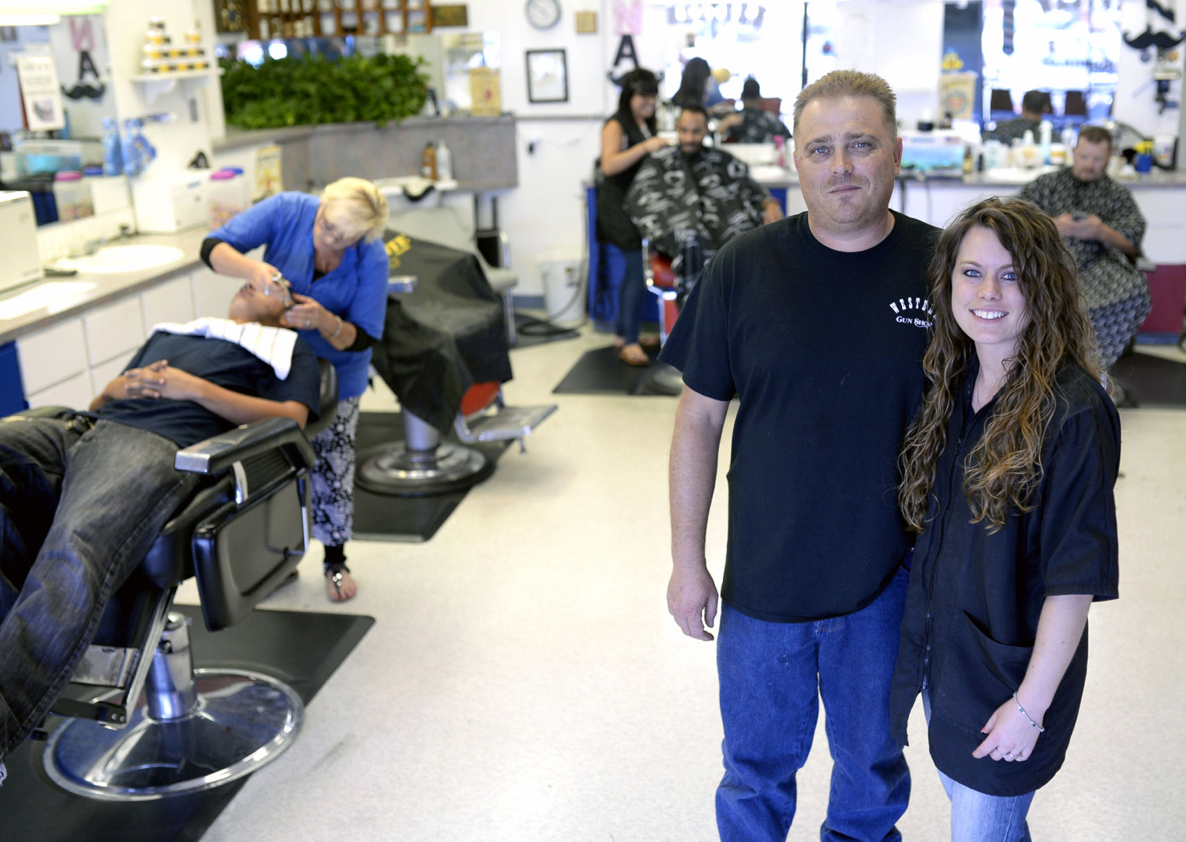 Want a gun with your haircut? Local barbershop opens gun store in back