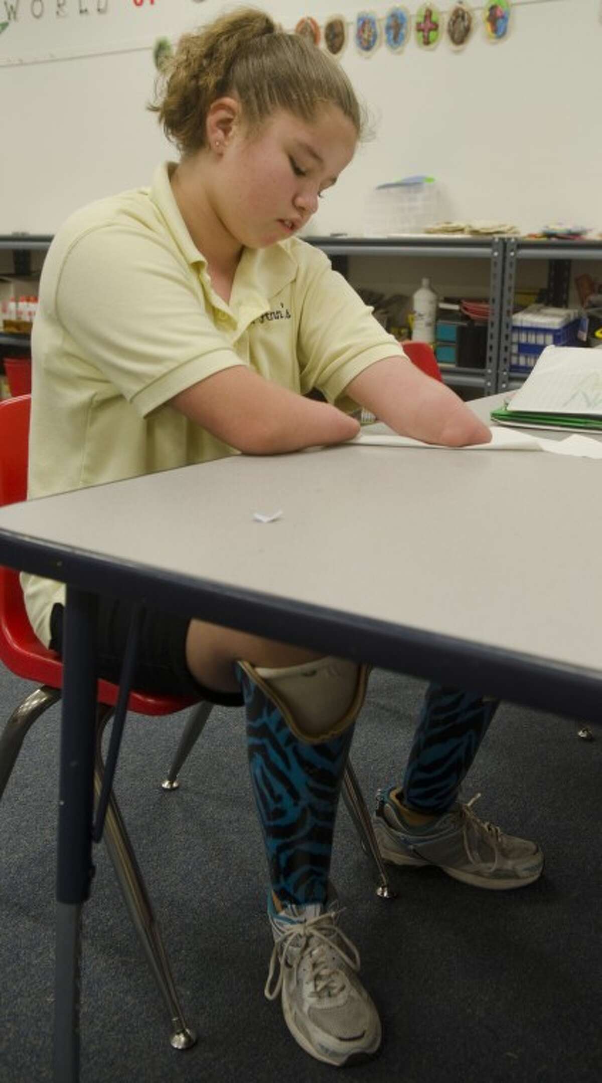 Girl born without hands and feet to compete today in track meet