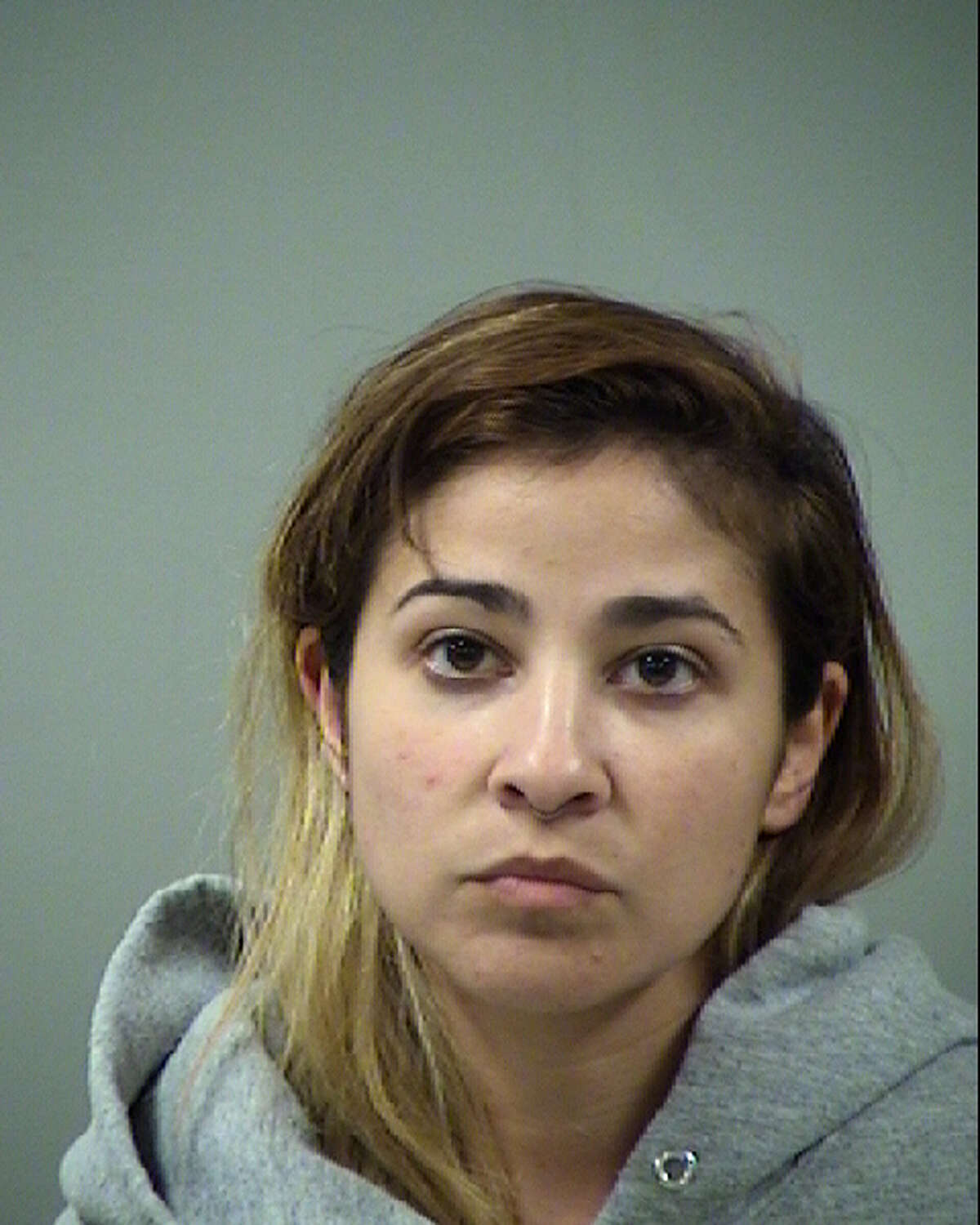 Woman charged in fatal April crash