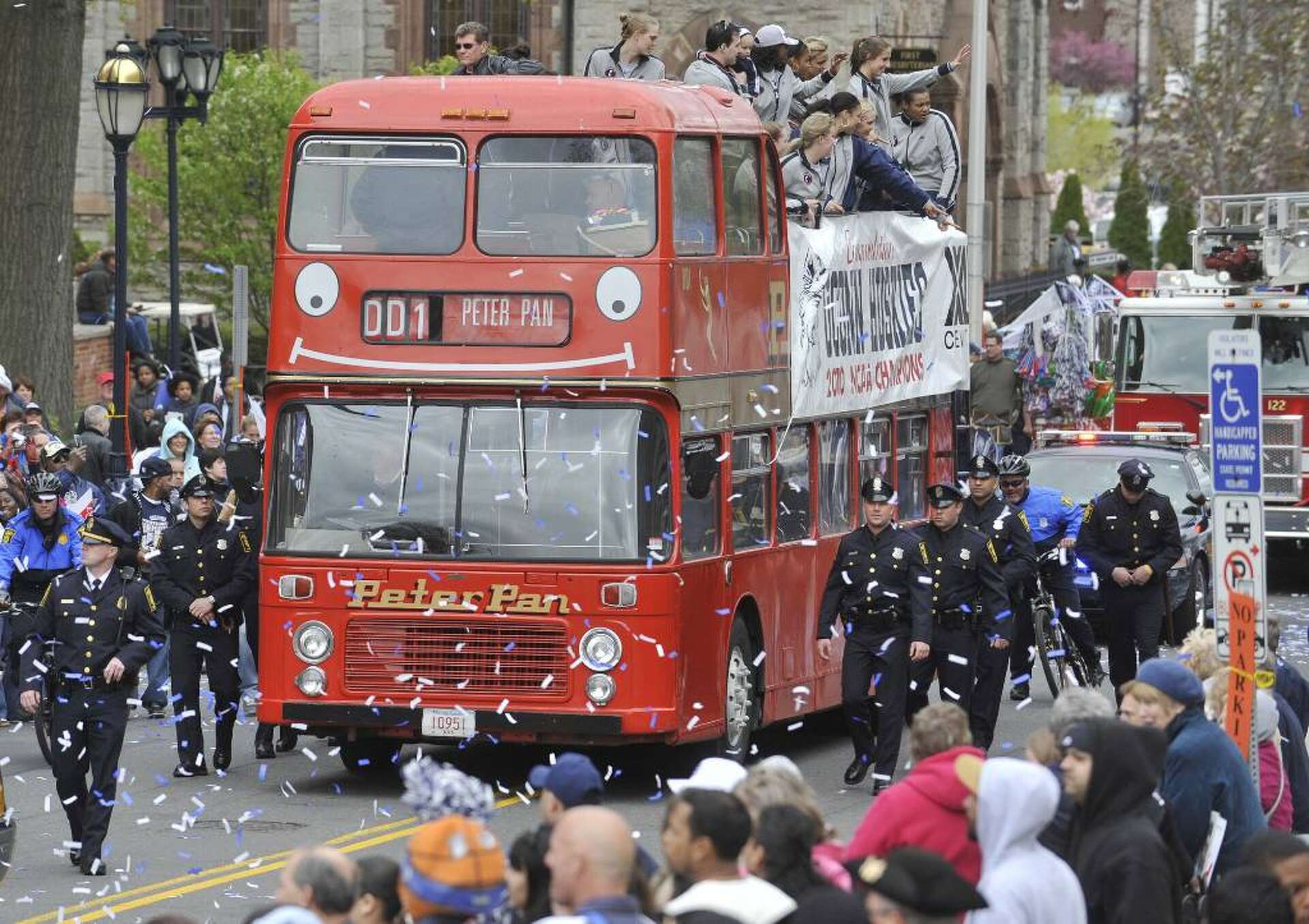 UConn women bask in victory parade glory