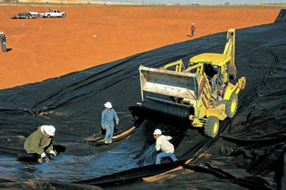 Frac pit double liners, leak detection no problem for Big D - Midland ...