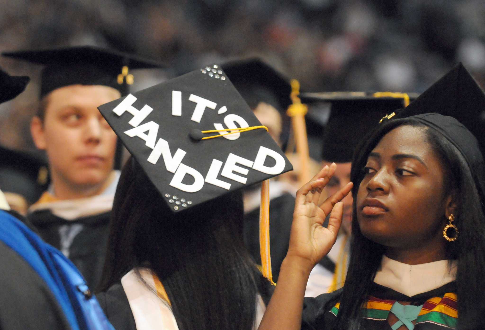 Hat contest: College graduates get creative