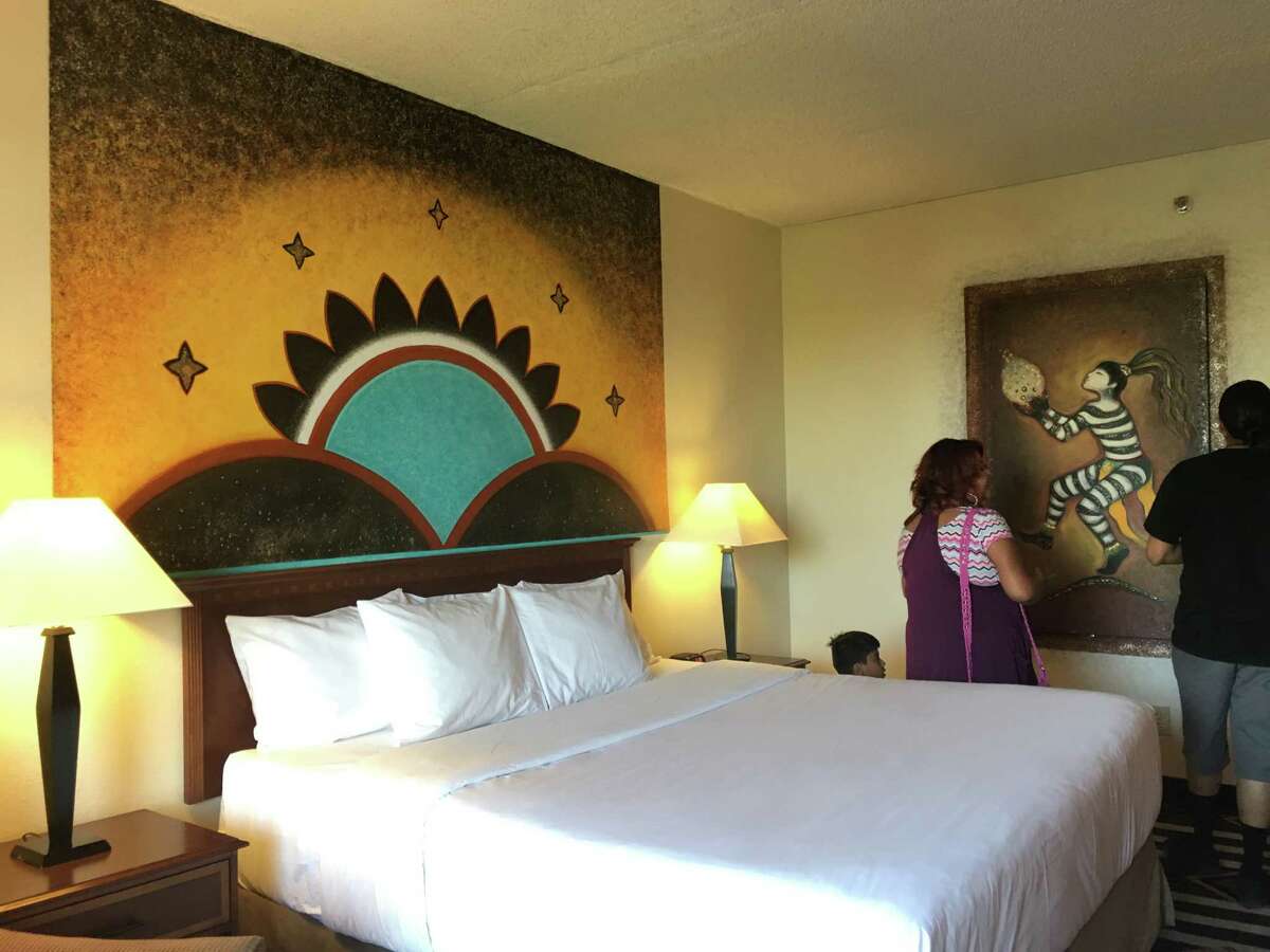 Native painters transform hotel rooms into works of art