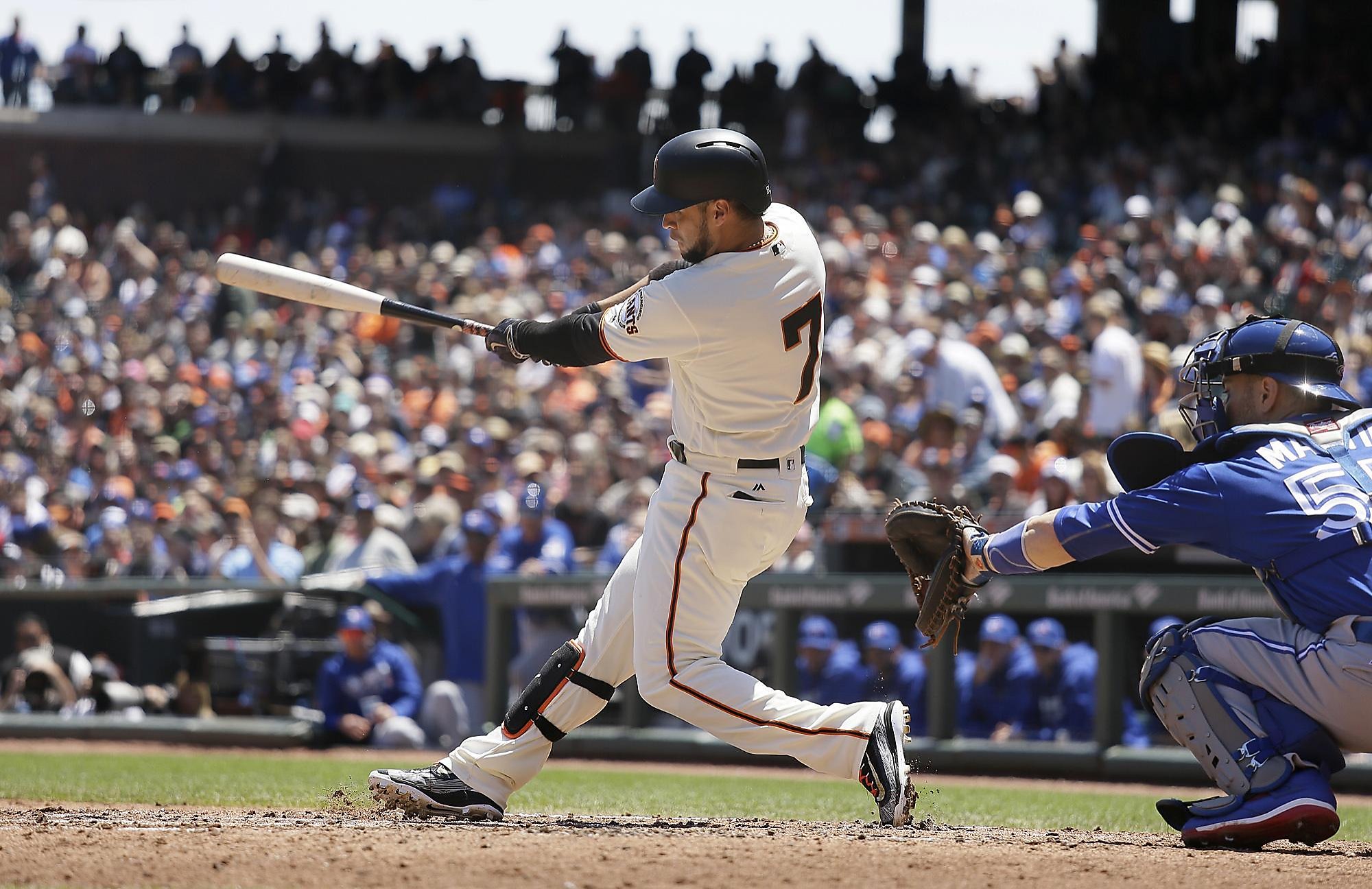 Giants blow late lead but beat Blue Jays in 13 innings