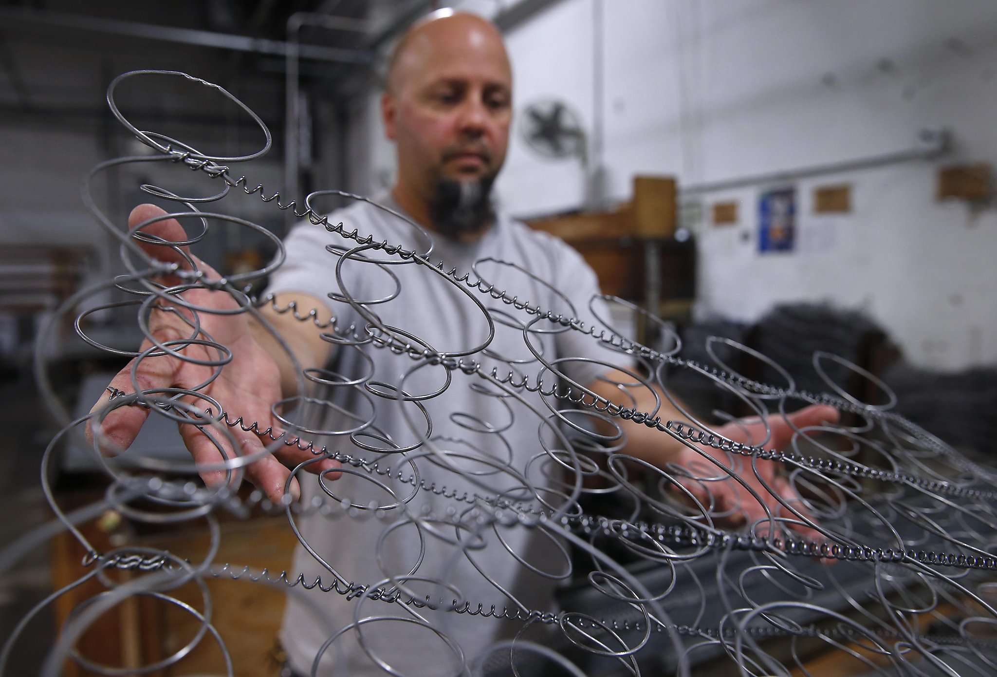 Manufacturing booming in old and new ways during high-tech era