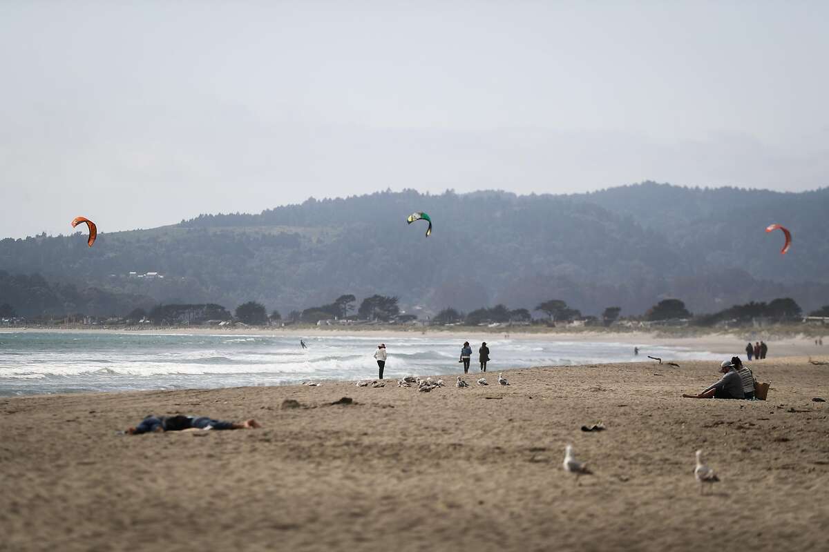 Surfers conquer Pacifica waves on International Surfing Day