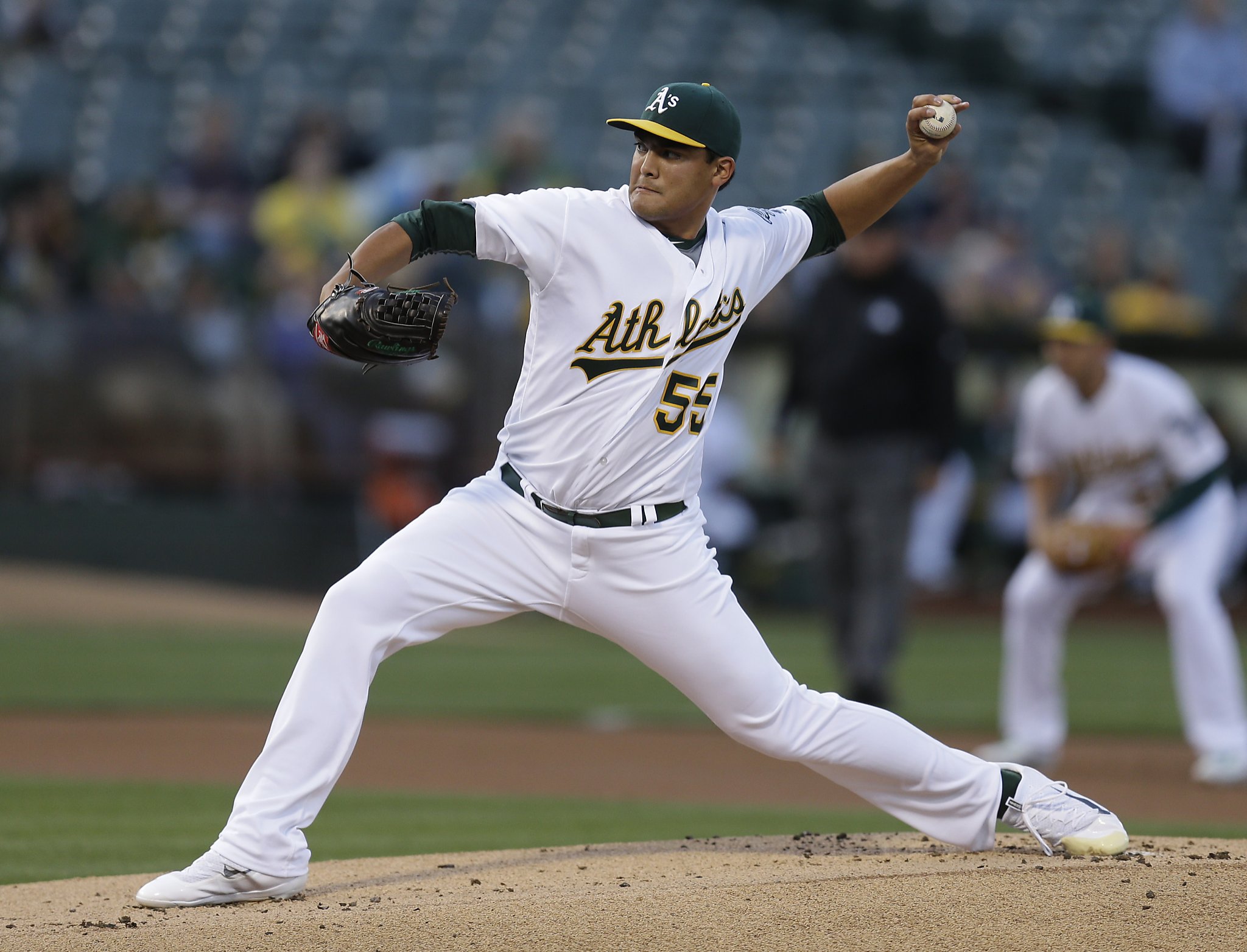 A’s Sean Manaea gets his 1st win, 3-1 over Rangers