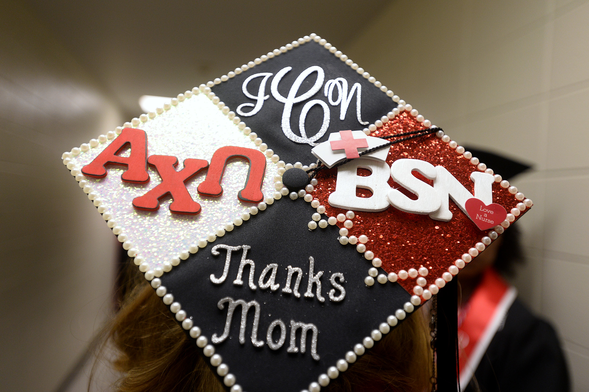 Lamar graduates customize caps