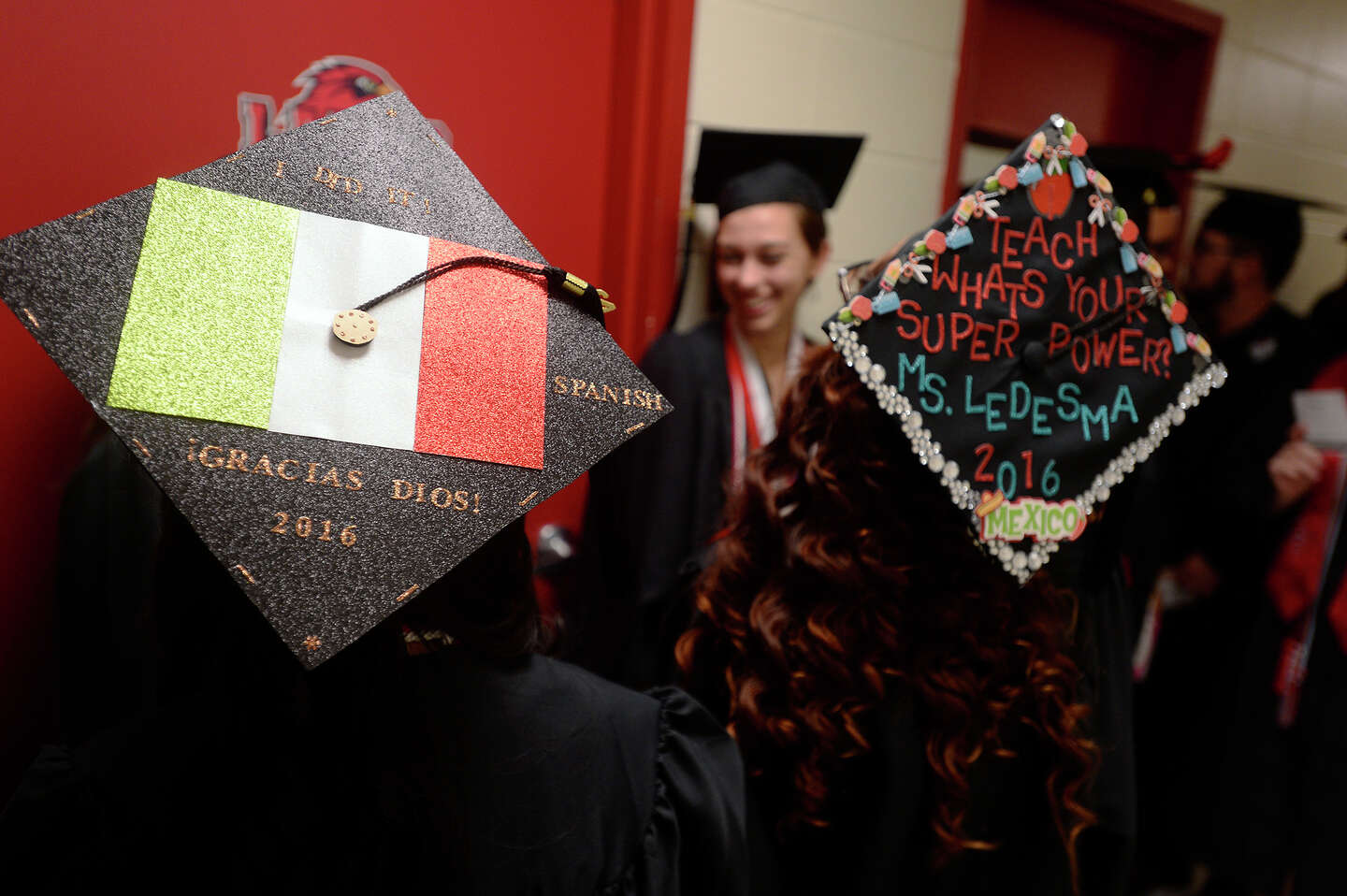 Lamar graduates customize caps