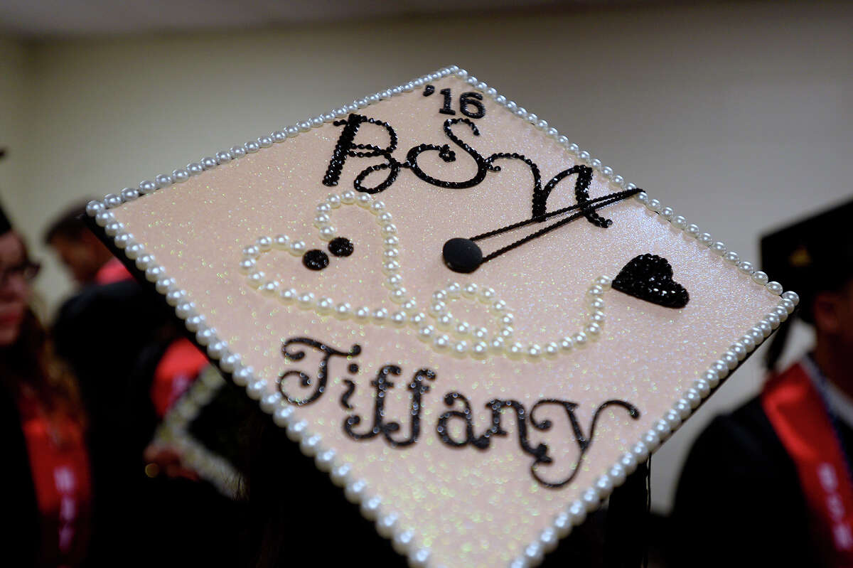 Lamar graduates customize caps
