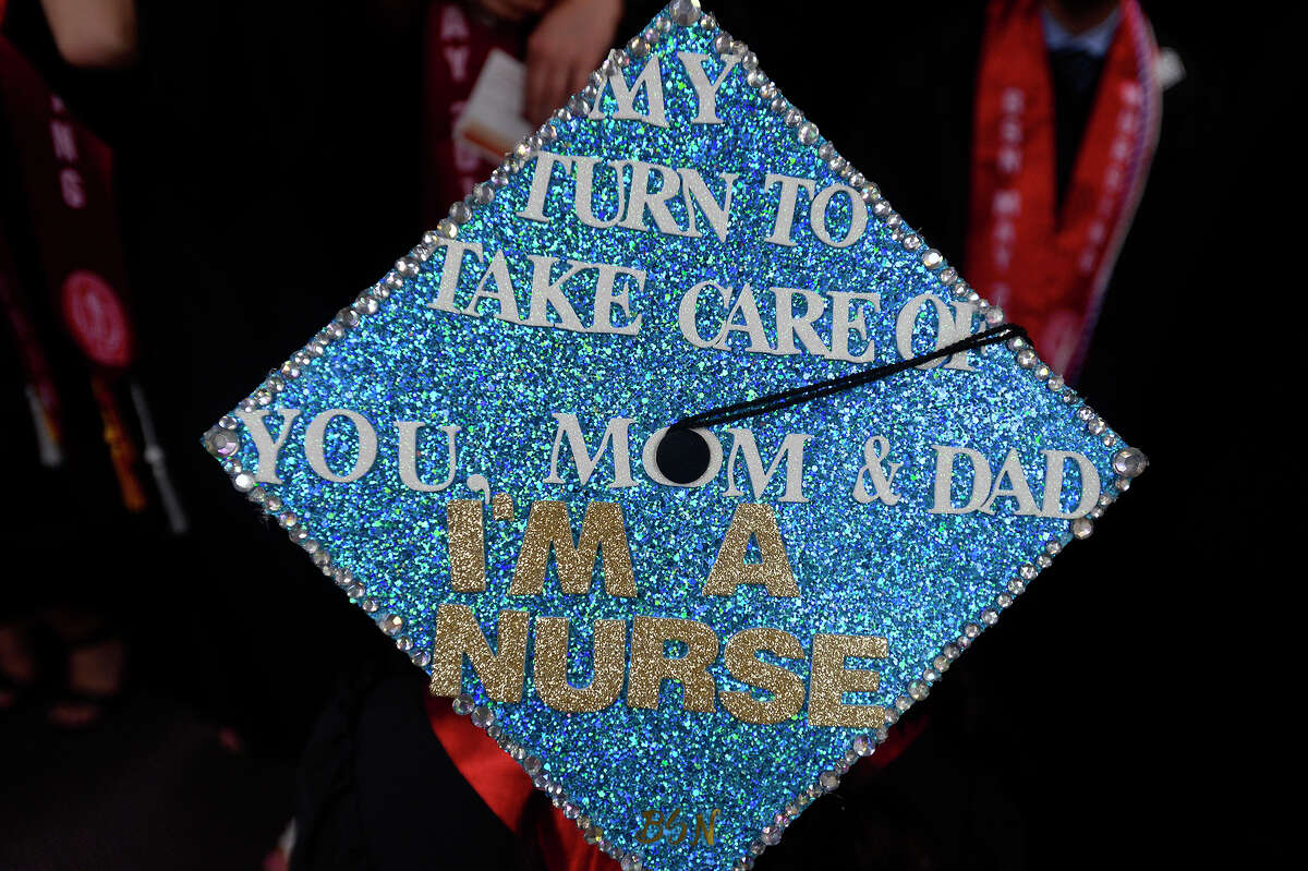 Lamar graduates customize caps