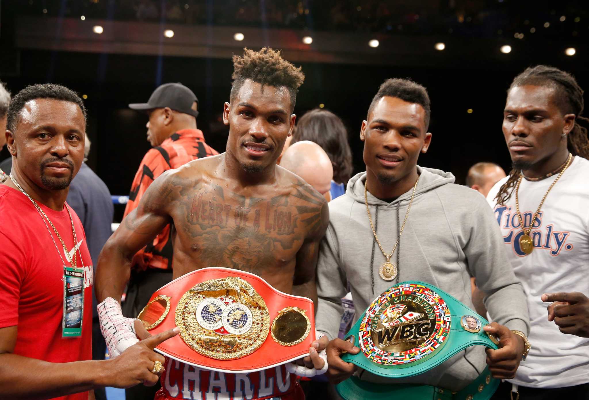 Simultaneous world title belts excite Houston boxing twins