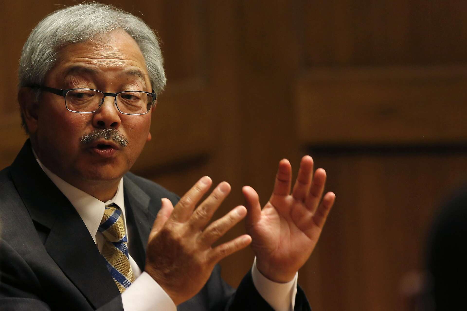 Low-key Ed Lee gets criticism from all sides