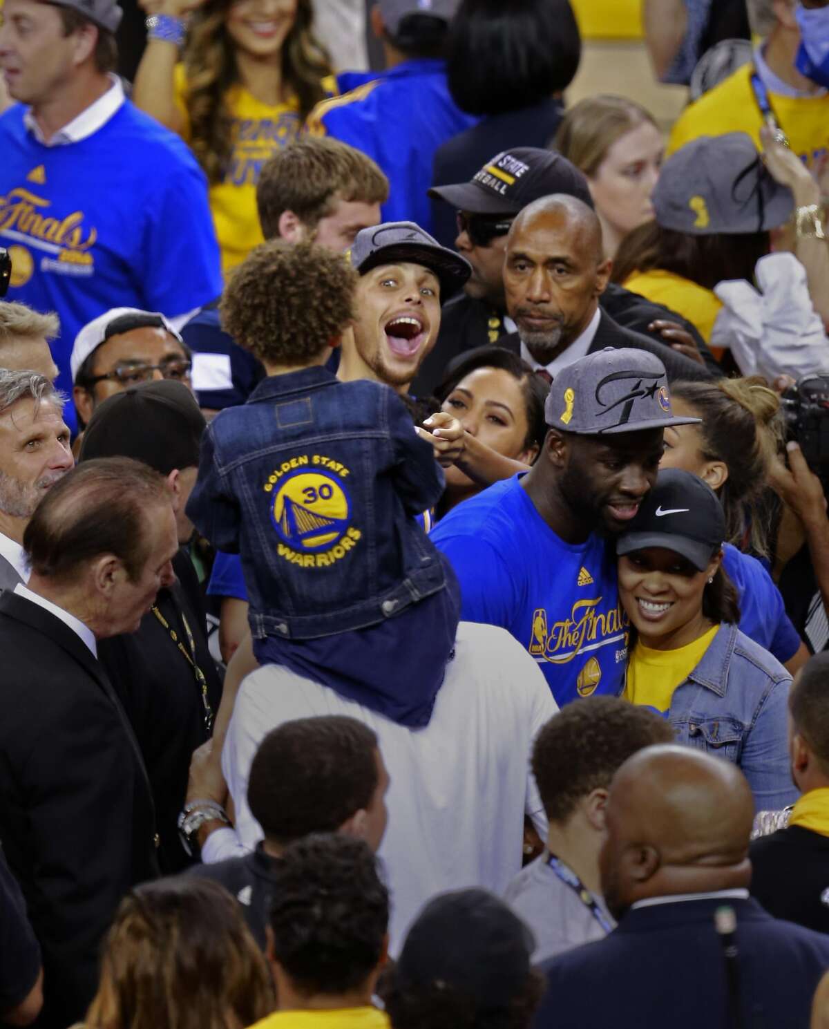 Who was that crazed Warriors fan photographed celebrating with Curry?