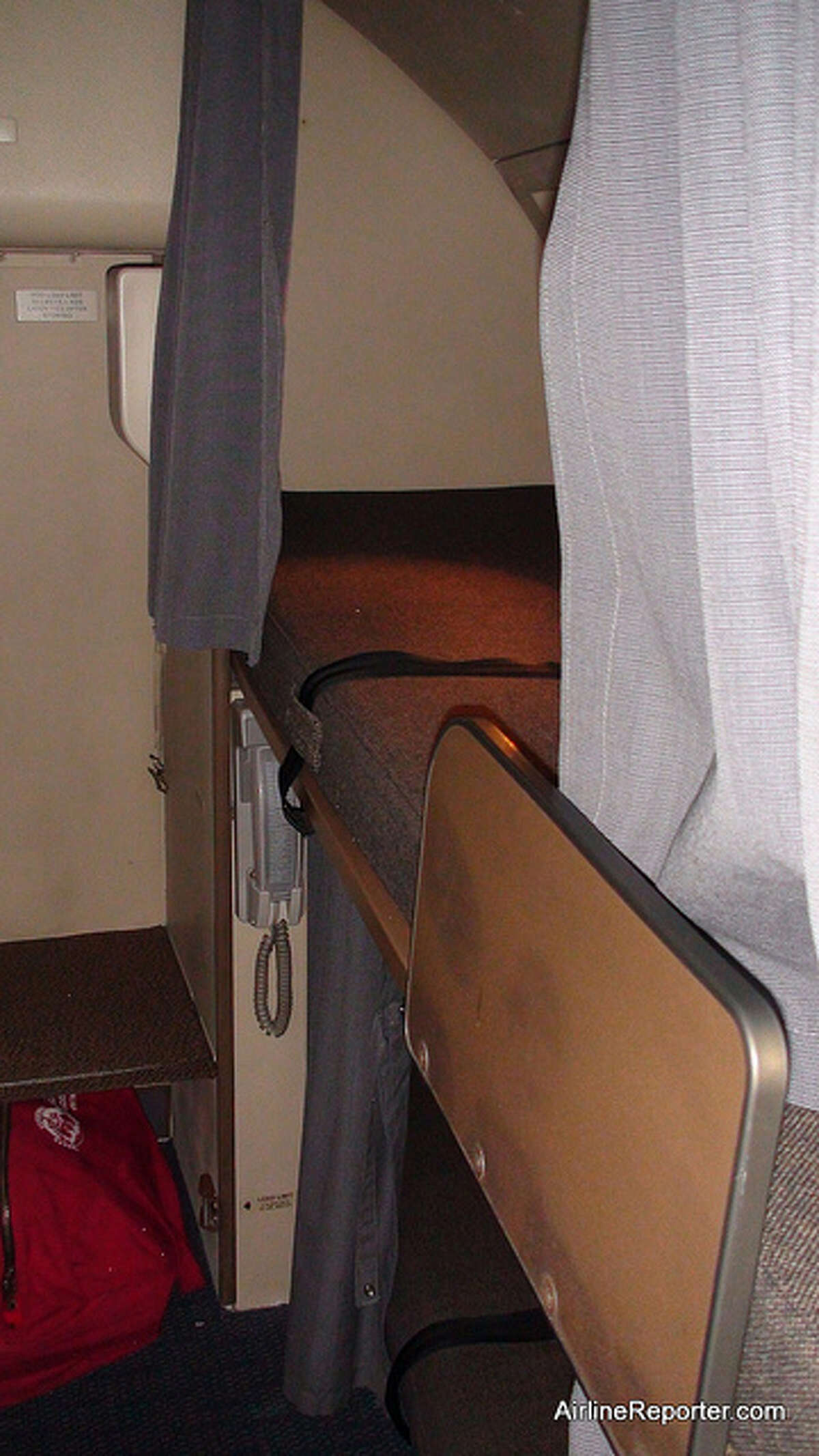 Inside the secret hideaways where flight attendants sleep on Boeing's 747