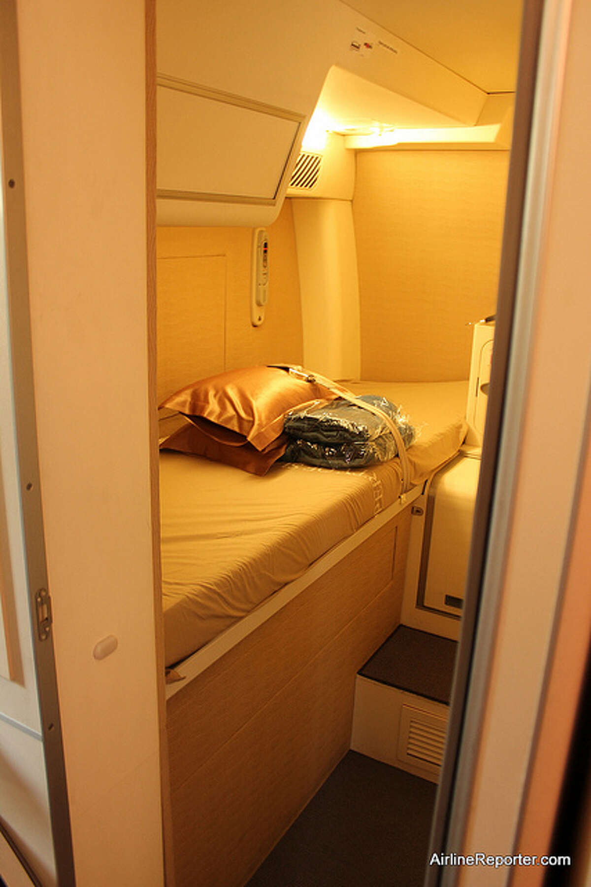 Inside the secret hideaways where flight attendants sleep on Boeing's 747