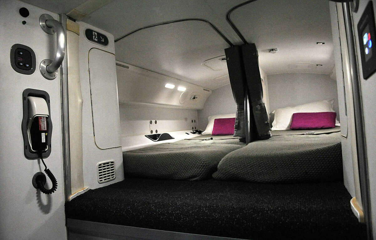 Inside the secret hideaways where flight attendants sleep on Boeing's 747