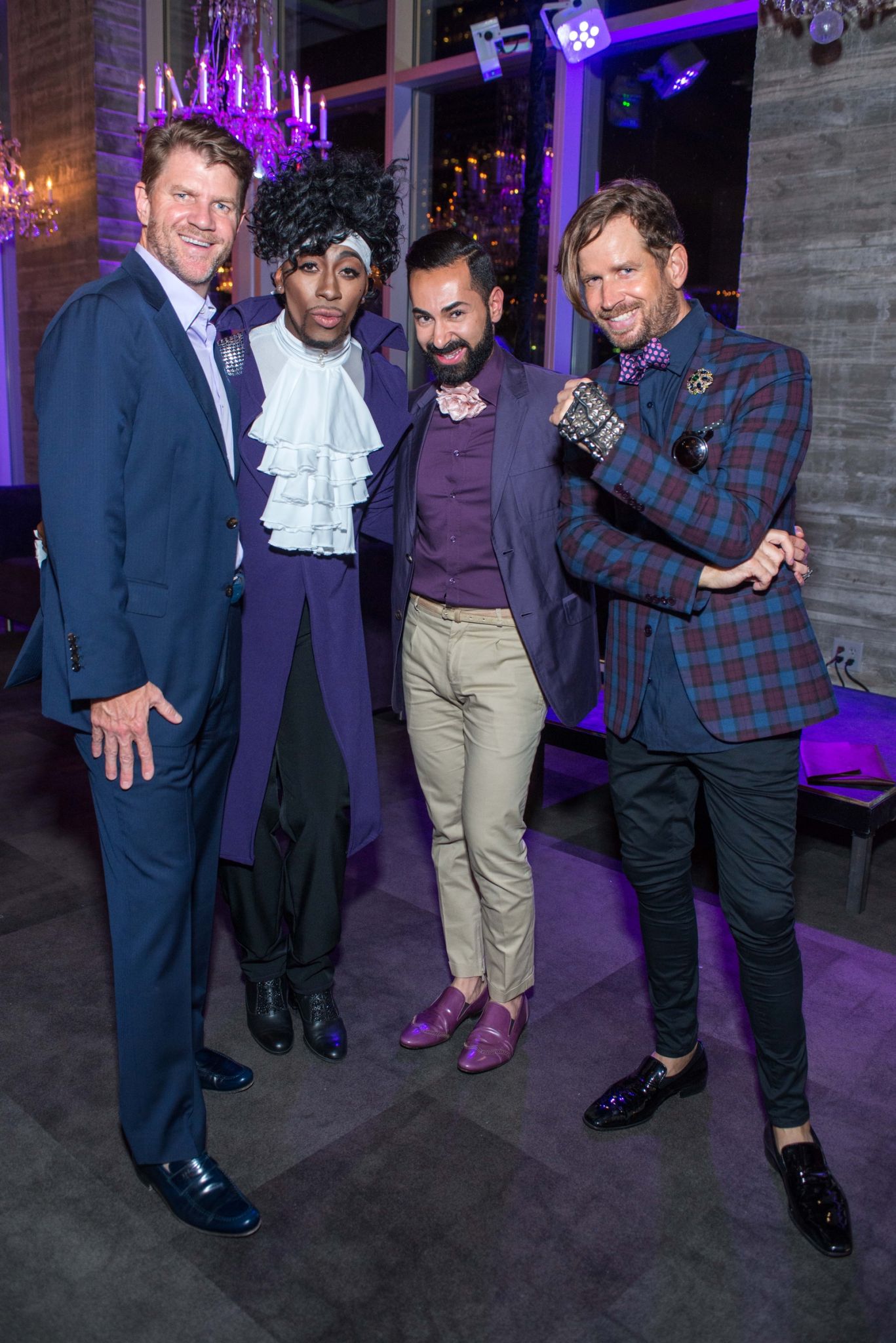 Little Black Dress Designer goes purple for Prince