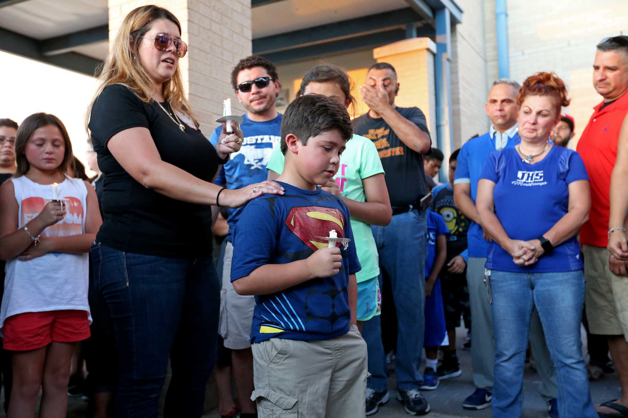 Marine vet killed while rescuing two teens remembered at vigil