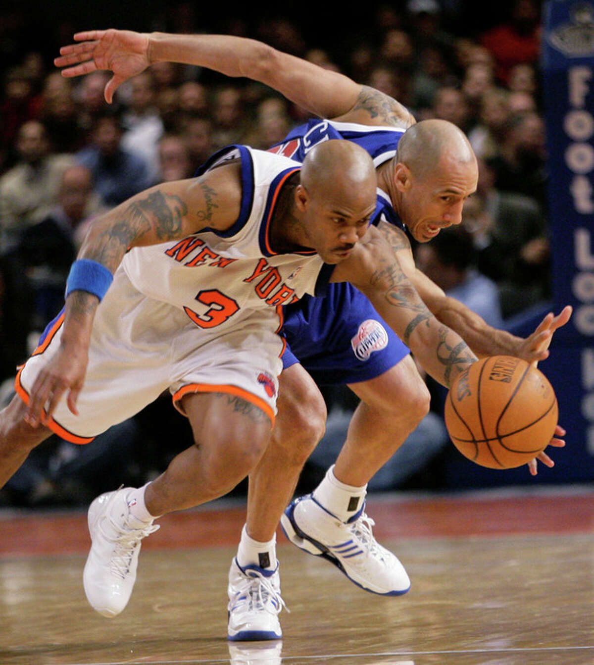 APNewsbreak: Rodman names team for exhibition