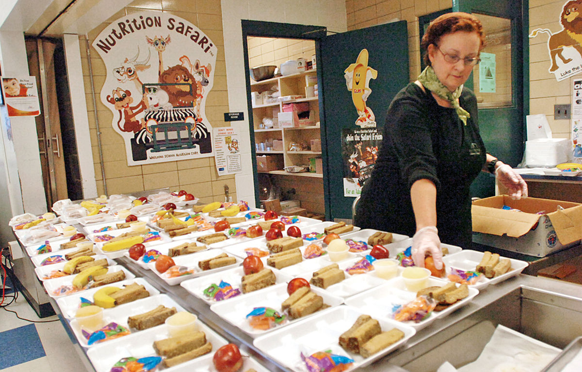 Kendall Elementary School cafeteria staff prepare lunch