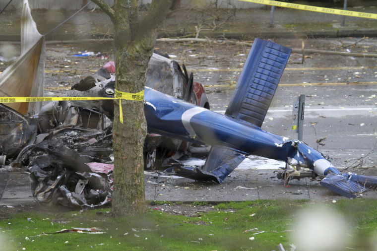 Investigators comb scene of deadly chopper crash