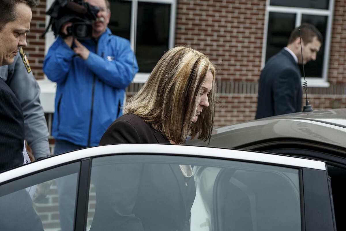 Officer charged with killing unarmed driver lying facedown