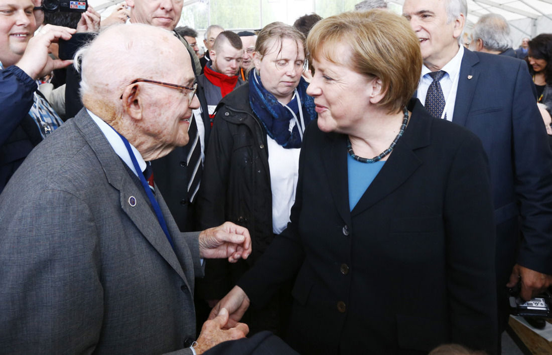 Merkel joins survivors, US vets to mark Dachau liberation