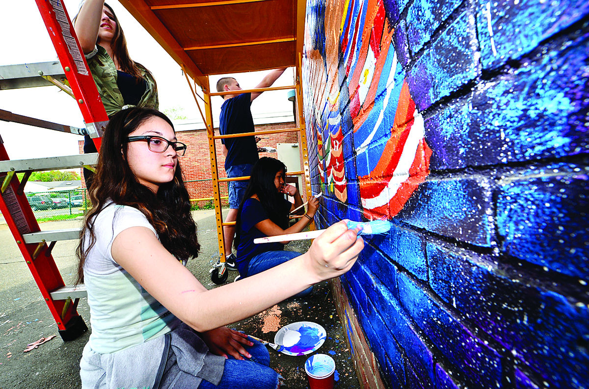 West Rocks eighth graders paint outdoor mural as gift to school