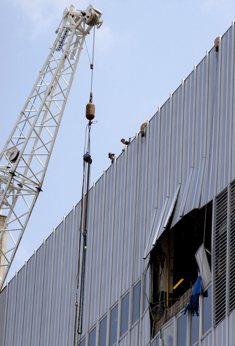 Material being lifted by crane in NYC falls; 10 injured