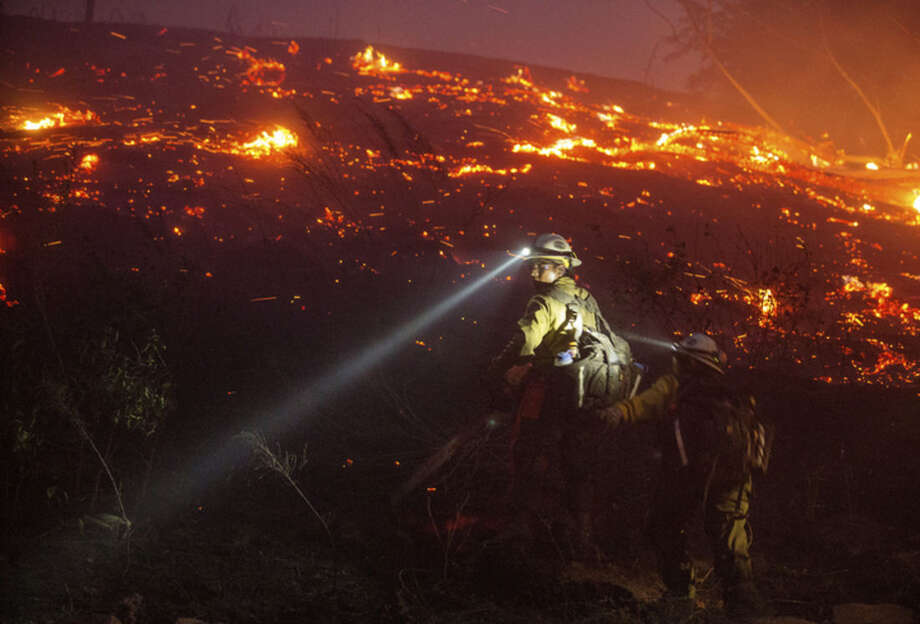 Residents return to smoldering ruins after damaging wildfire - The Hour