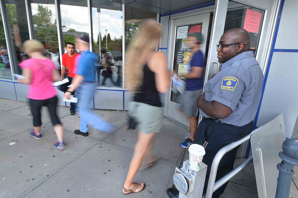 DMV reopens to long lines, 'disgruntled' staff