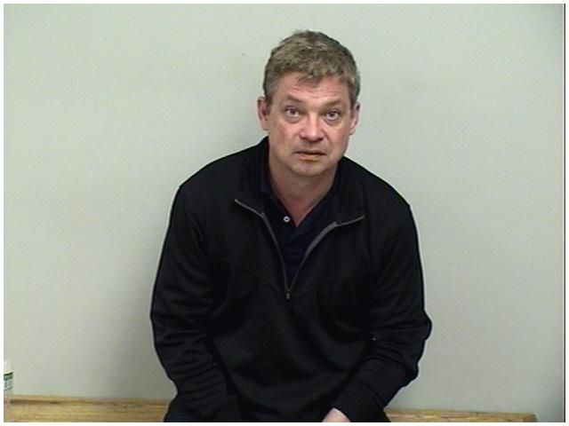 Darien man charged twice for stalking