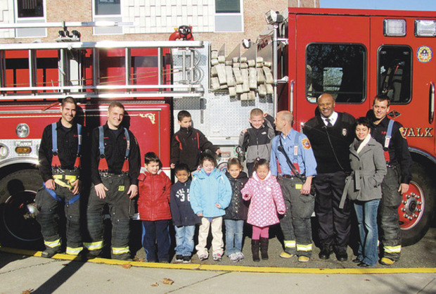 In time for holidays, local fire union donates $3,500 to city schools