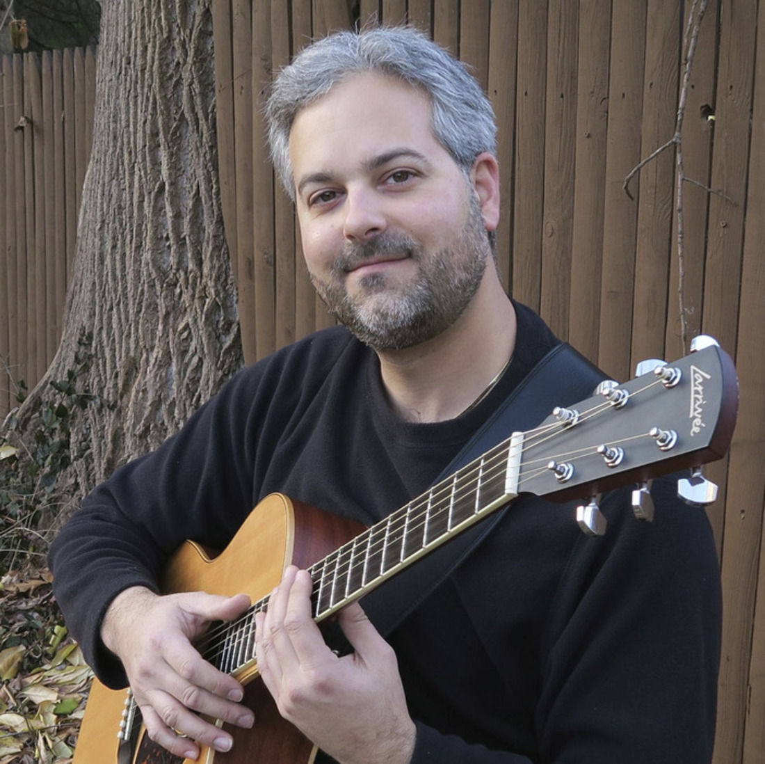 Norwalk finger-style guitarist Glenn Roth's new disc is a "Welcome Home"