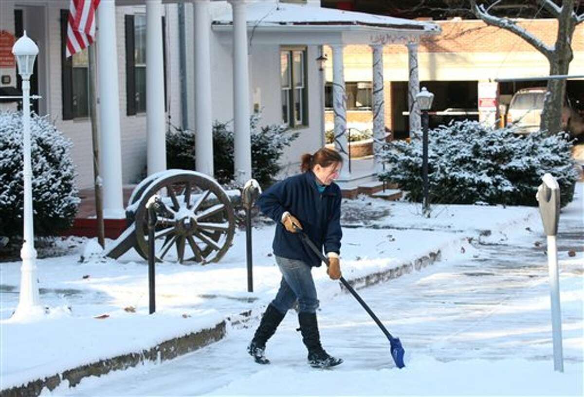 Attorney Anna Hammond. Arctic blast. Shovels snow.