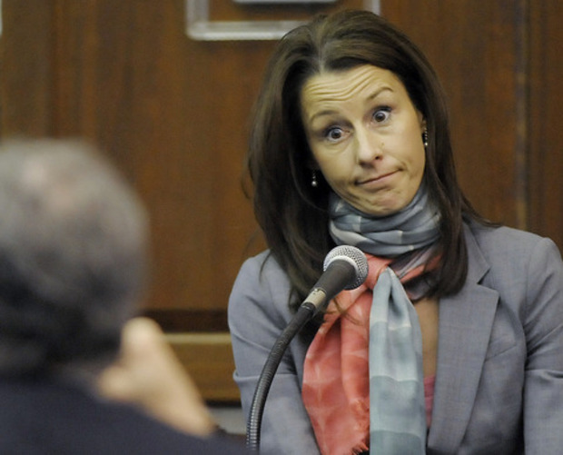 Wife of Edwards aide breaks down on witness stand while testifying