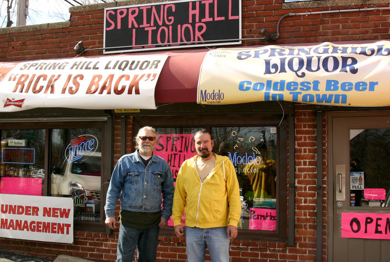 Spring Hill Liquor returns — so does pink building
